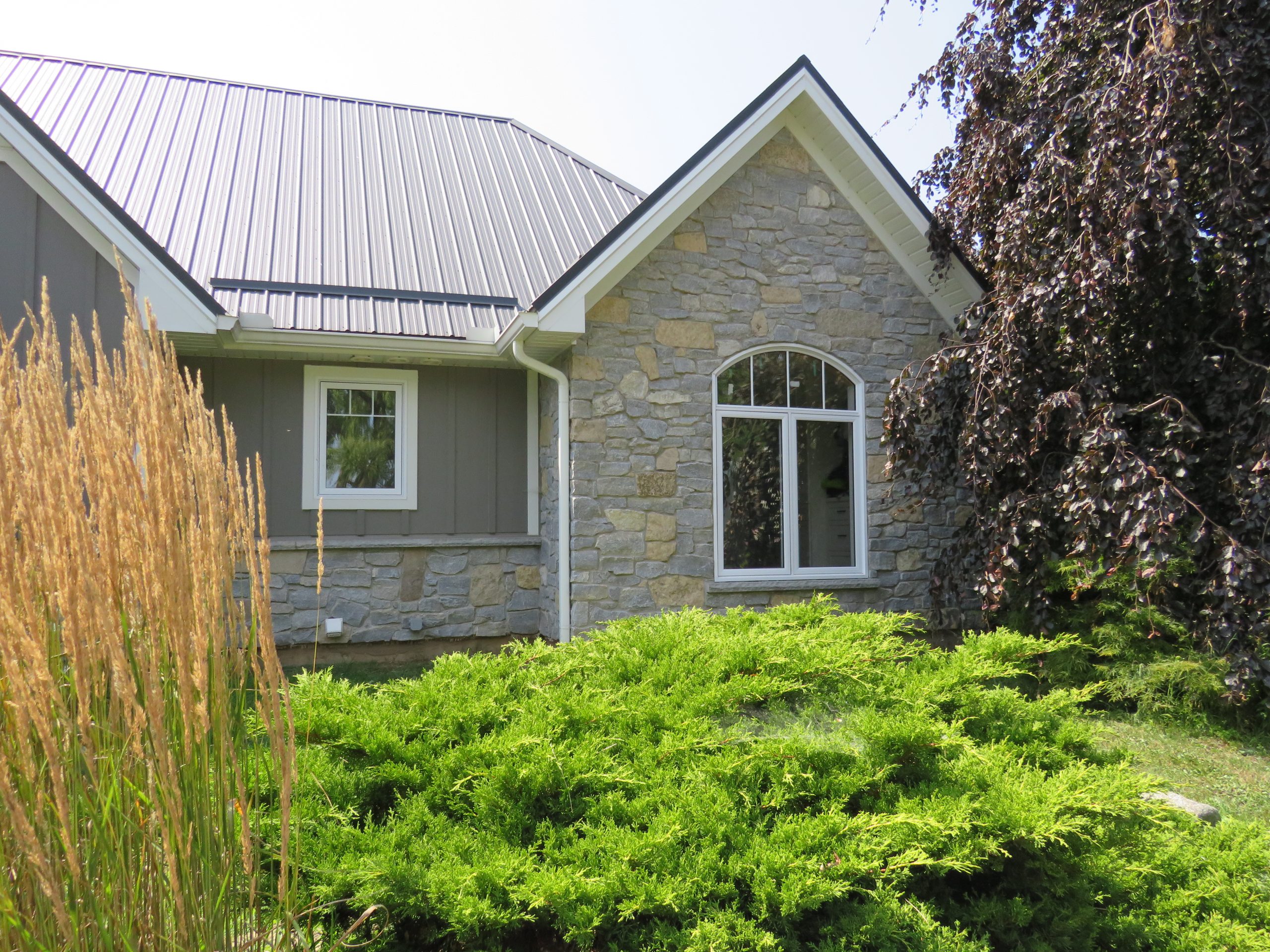 Tumbled Weatheredge Limestone with 20% Rustic Brown on House in St ...