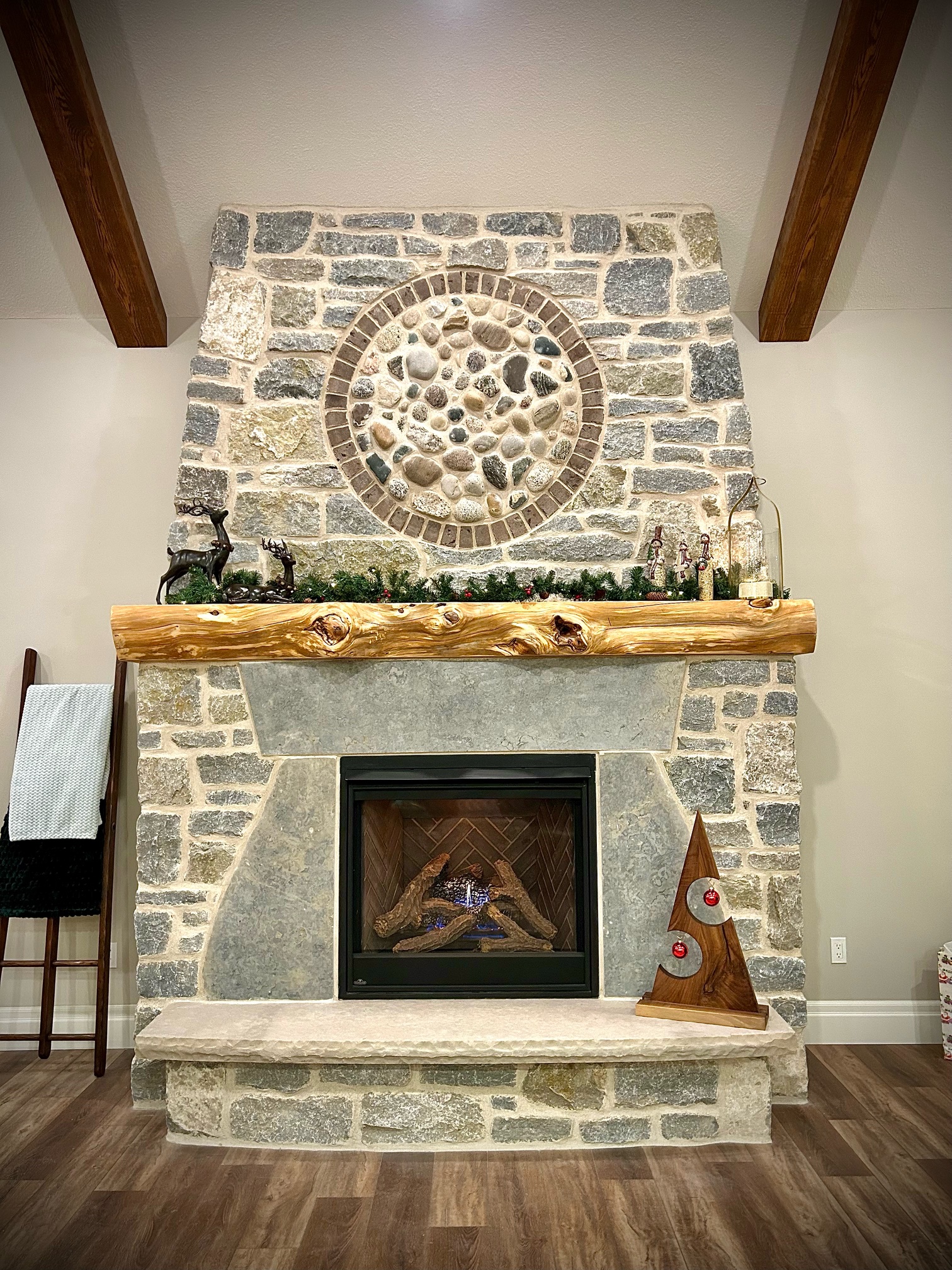 Tumbled Weatheredge Limestone Fireplace with Beach Pebbles in Circle ...