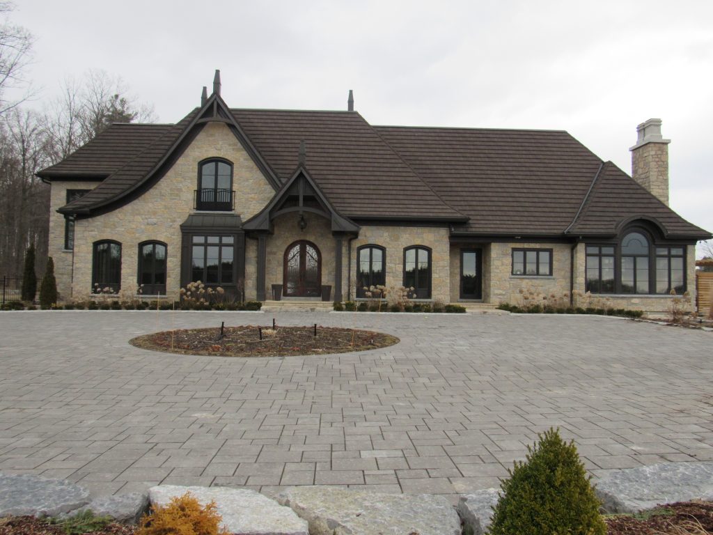Tumbled Harvest Gold Limestone House - Colonial Brick & Stone Inc.